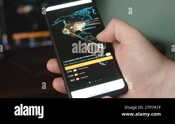 Cyber attack map navigation on smartphone. Displays Show Various ...