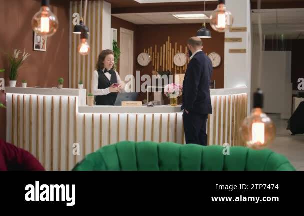 Entrepreneur shows passport at check in and offers id info credentials ...