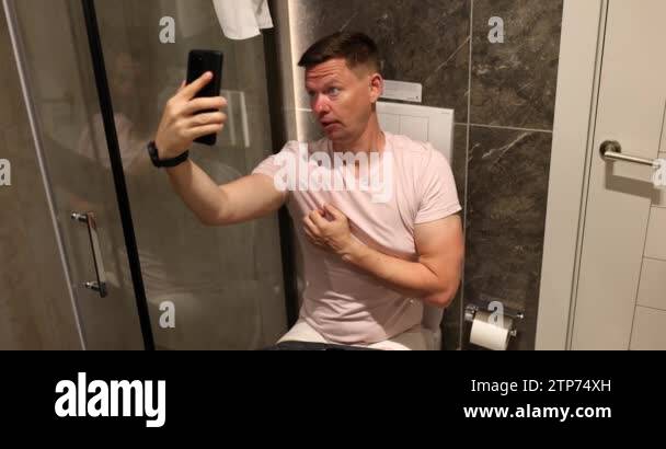 Sitting on toilet bored Stock Videos & Footage - HD and 4K Video Clips ...