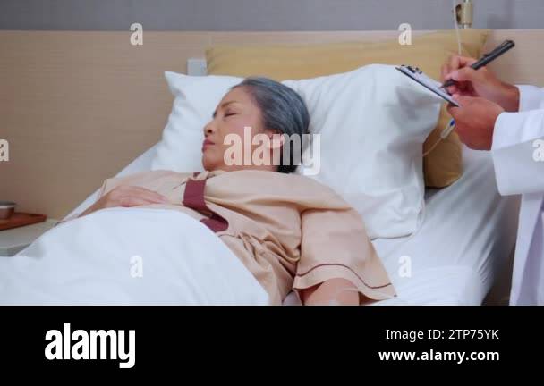 Hospital woman asleep bed Stock Videos & Footage - HD and 4K Video Clips - Alamy