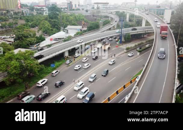 Drone view footage of highway and flyover with cars and truck in ...