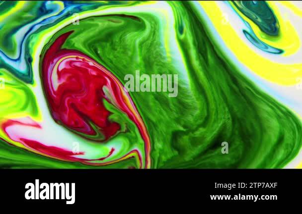 This stock video shows what happens when milk is introduced to a mixed ...