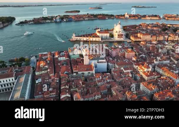 Venice from the sky, showcasing Basilica, Grand Canal, Punta della ...