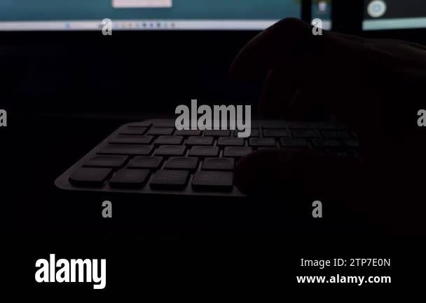 In this video, close-up shots capture fingers deftly typing on a ...