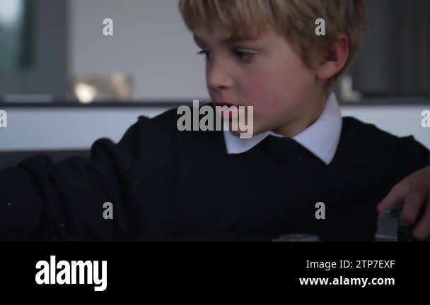 Two little boys fighting over toy car. Older brother wanting to take ...