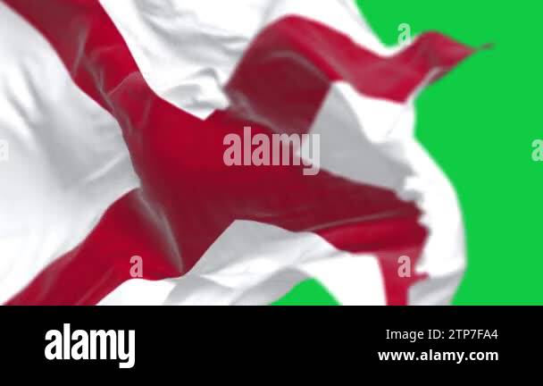 The state flag of Alabama waving in the wind isolated on a green screen ...