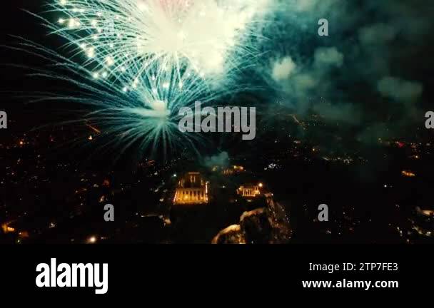 Fireworks explode over the temple of the Parthenon at the Acropolis ...