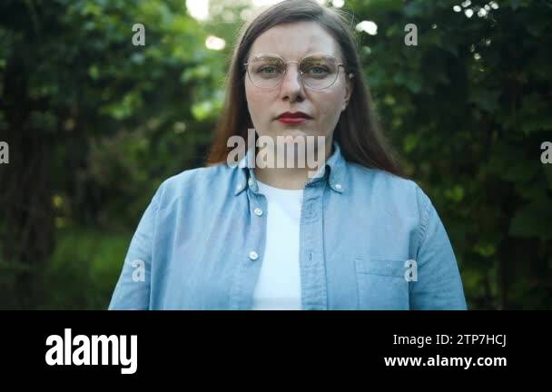 Signal for help. Woman shows how to make hand gesture to ask for help ...
