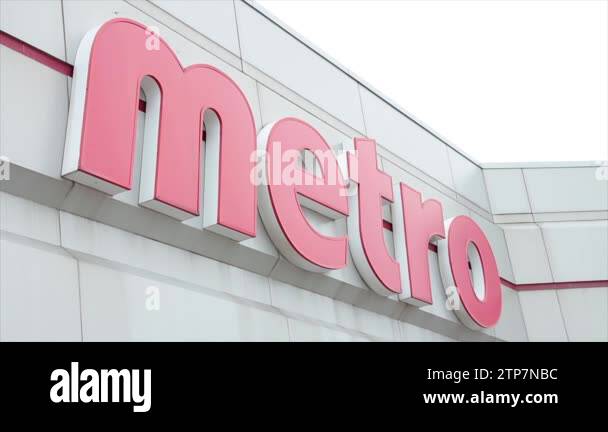 metro grocery store chain logo on store wall Stock Video Footage - Alamy
