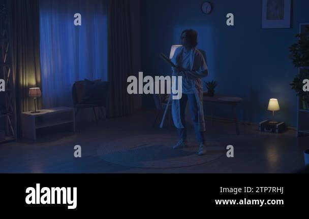 Video of a house owner, tenant, going around her house with a baseball ...