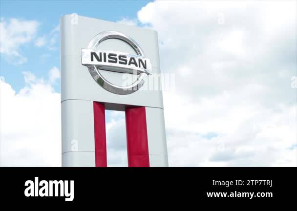 nissan silver logo sign exterior outside outdoors on white red ...