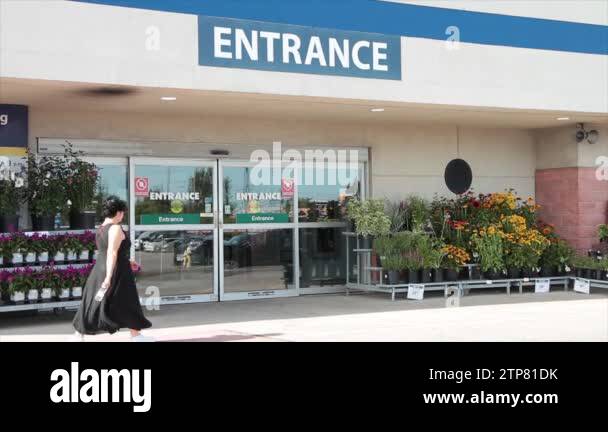 entrance writing caption text facade sign word in white on blue outside ...