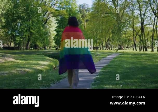 Concept of lgbt community in the park happy and smiling lesbian woman ...