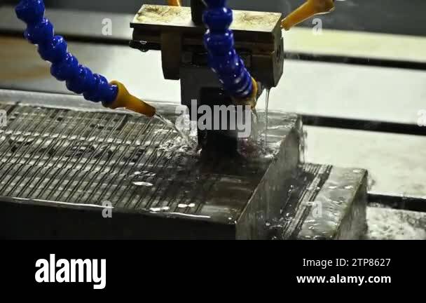 Slow motion scene the EDM machine working process with graphite ...