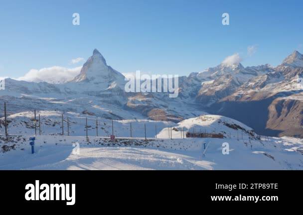 Gornergrat bahn railway running towards summit station with Matterhorn ...