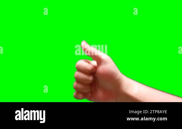a man's hand forming a dislike symbol on a green screen background ...