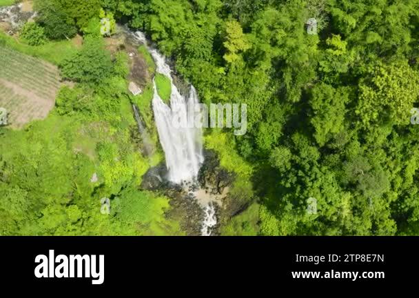 Beautiful water streaming down from a mountain. Lasang Falls. Bukidnon ...
