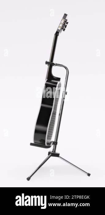 Black colorful guitar, isolated in white background, music concept ...