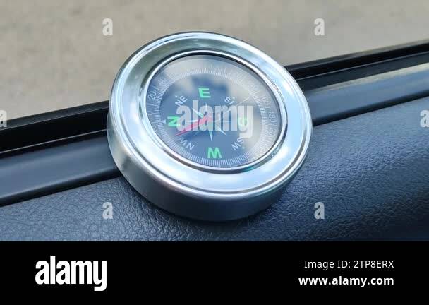 metal compass in hand. silver antique compass.retro compass. terrain ...