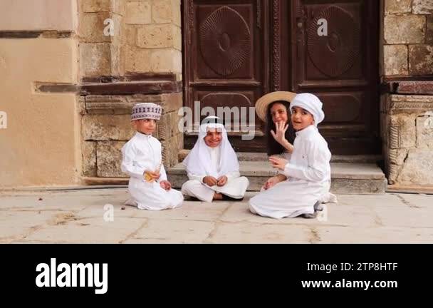 Saudi Arabian kids playing outside the house in Jeddah old town Saudi ...
