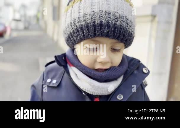 Boy in winter attire Stock Videos & Footage - HD and 4K Video Clips - Alamy