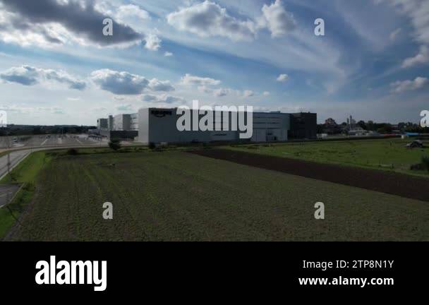 modern distribution logistic center aerial drone view of industrial ...