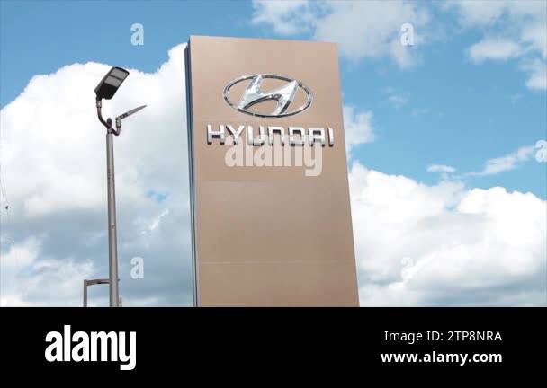 hyundai silver logo sign on gray pillar outside outdoors exterior going ...