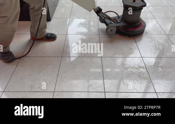 Renovation and polishing of an old beige marble with a professional ...