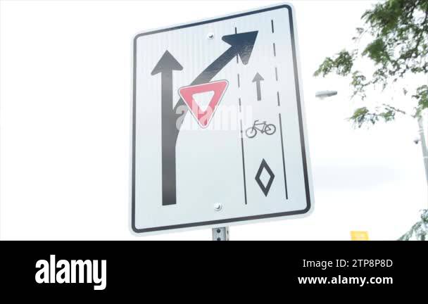 Bike lane yield sign Stock Videos & Footage - HD and 4K Video Clips - Alamy