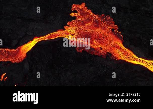 Volcano Eruption, Lava River Flows Down the Mountain Slope, Red-hot ...