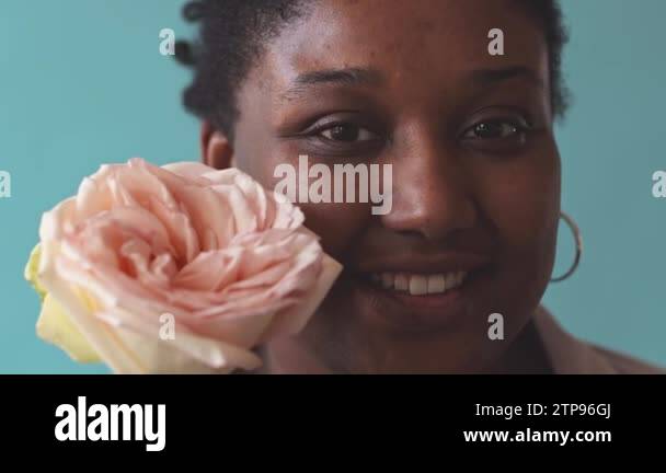 African woman rose flower Stock Videos & Footage - HD and 4K Video ...