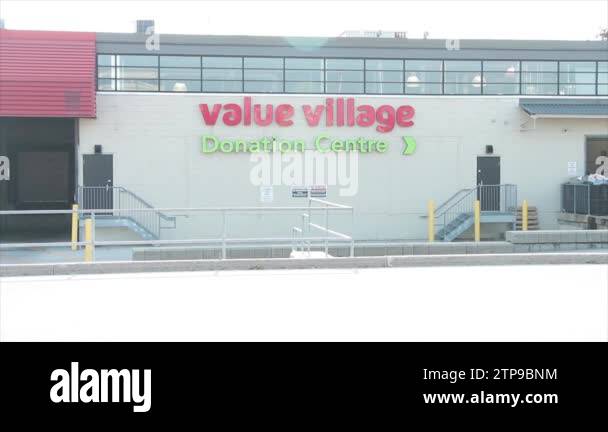 value village donation centre center sign logo on back of store with ...