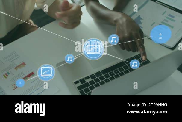 Animation of connected icons, overhead view of diverse coworkers ...