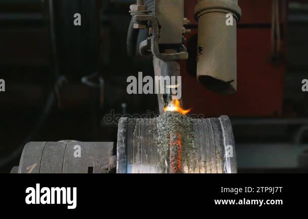 Welding robots apply overlay weld protection on the pipe disks ...