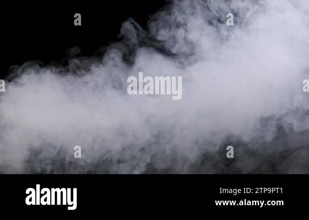 Jet stream of smoke or vapor on black background in slow motion 4K ...