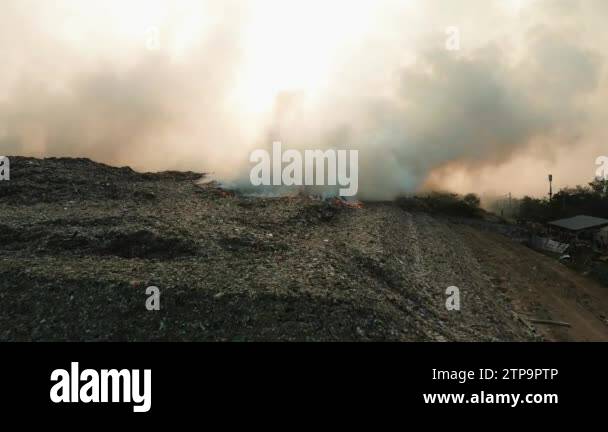 Flying a drone over a fire that occurred at a landfill on the island of ...