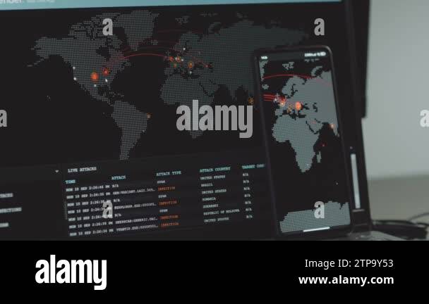 Global cyber attack with world map on mobile phone and computer screen ...
