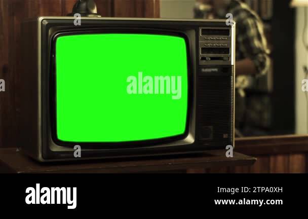 80s Television with Greenscreen. Teen talking to Retro Phone. Ready to ...