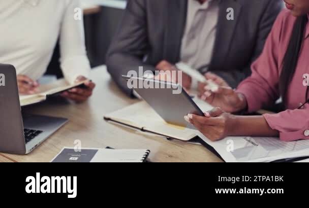 Hands, tablet and business people talking in presentation, discussion ...