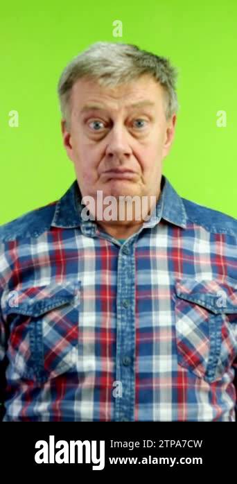 Positive caucasian man looking at camera nodding head answering yes ...