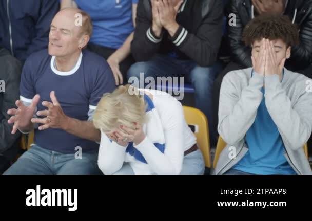 4K Sports crowd expressing disappointment, watching live game in ...