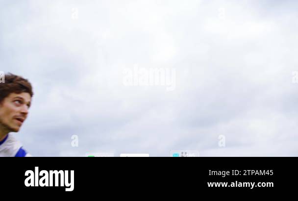 Animation of notification bars, caucasian soccer player hitting ball ...