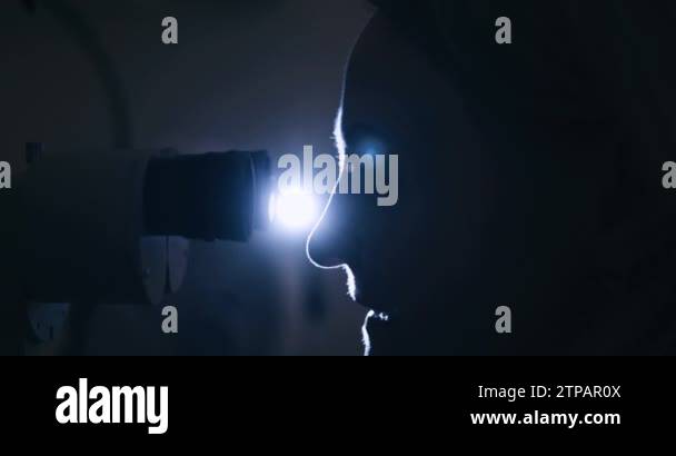 Eye care, machine test and man in office to check iris, pupil and ...