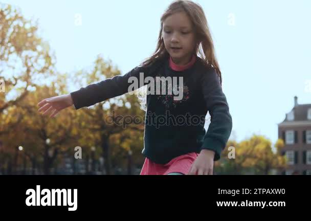Portrait of preschool girl in adventure park. Cute happy child with ...