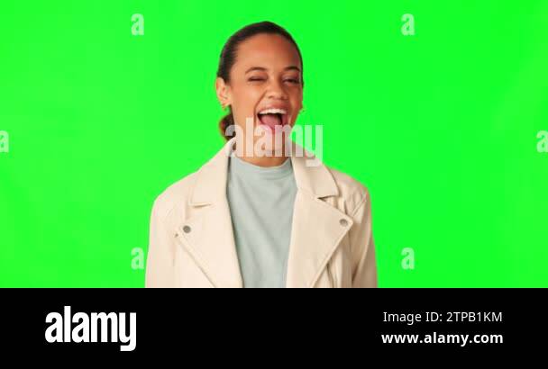 Business woman, wink and face by green screen for secret, comic joke ...