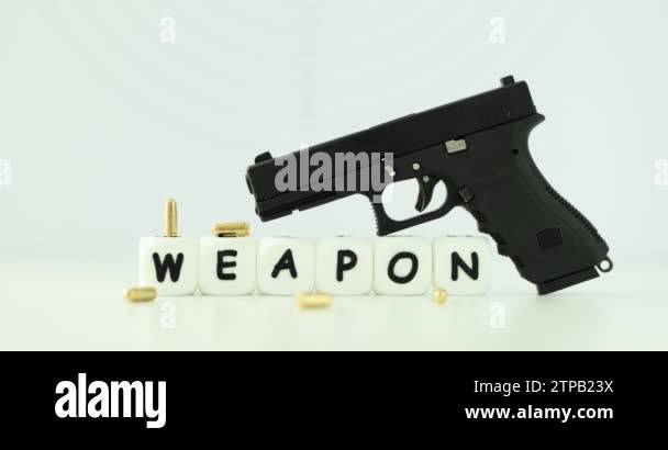 Pistol golden bullets and black pistol word weapon. Pistol cartridge ...