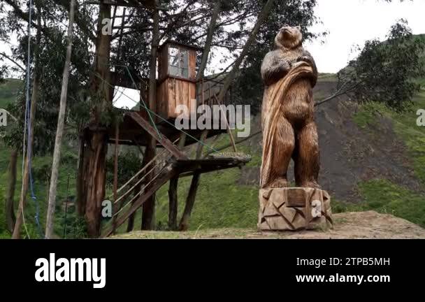 wooden sculpture of a spectacled bear, Tremarctos ornatus, native to ...