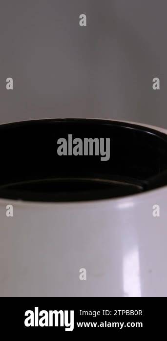 Cooking Popcorn popping on heated fry pan. Slow Motion. Making Popcorn ...