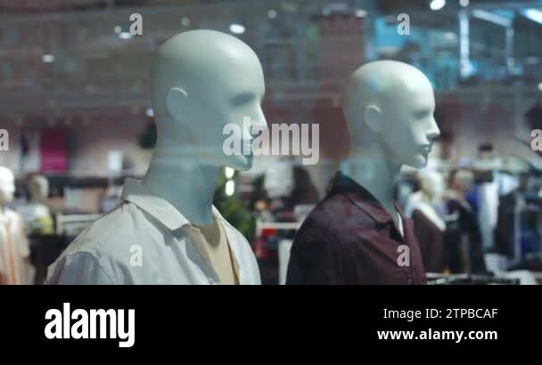 stylish male mannequins in clothes in a large shopping mall in a ...