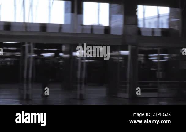 Interior of Rome Termini train station in the 1960s. The footage shows ...